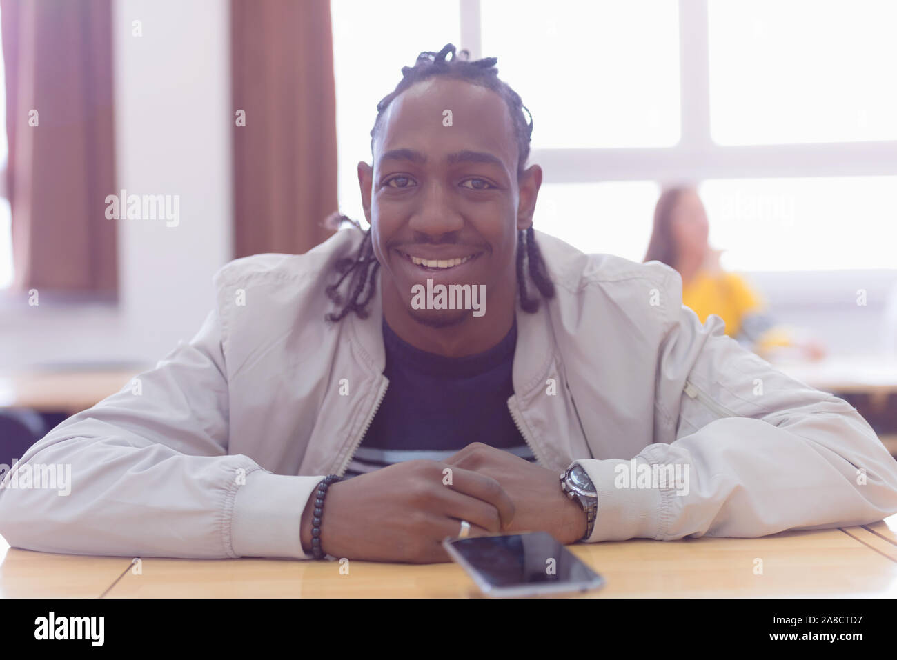 Male african american university student work at computer lab at ...