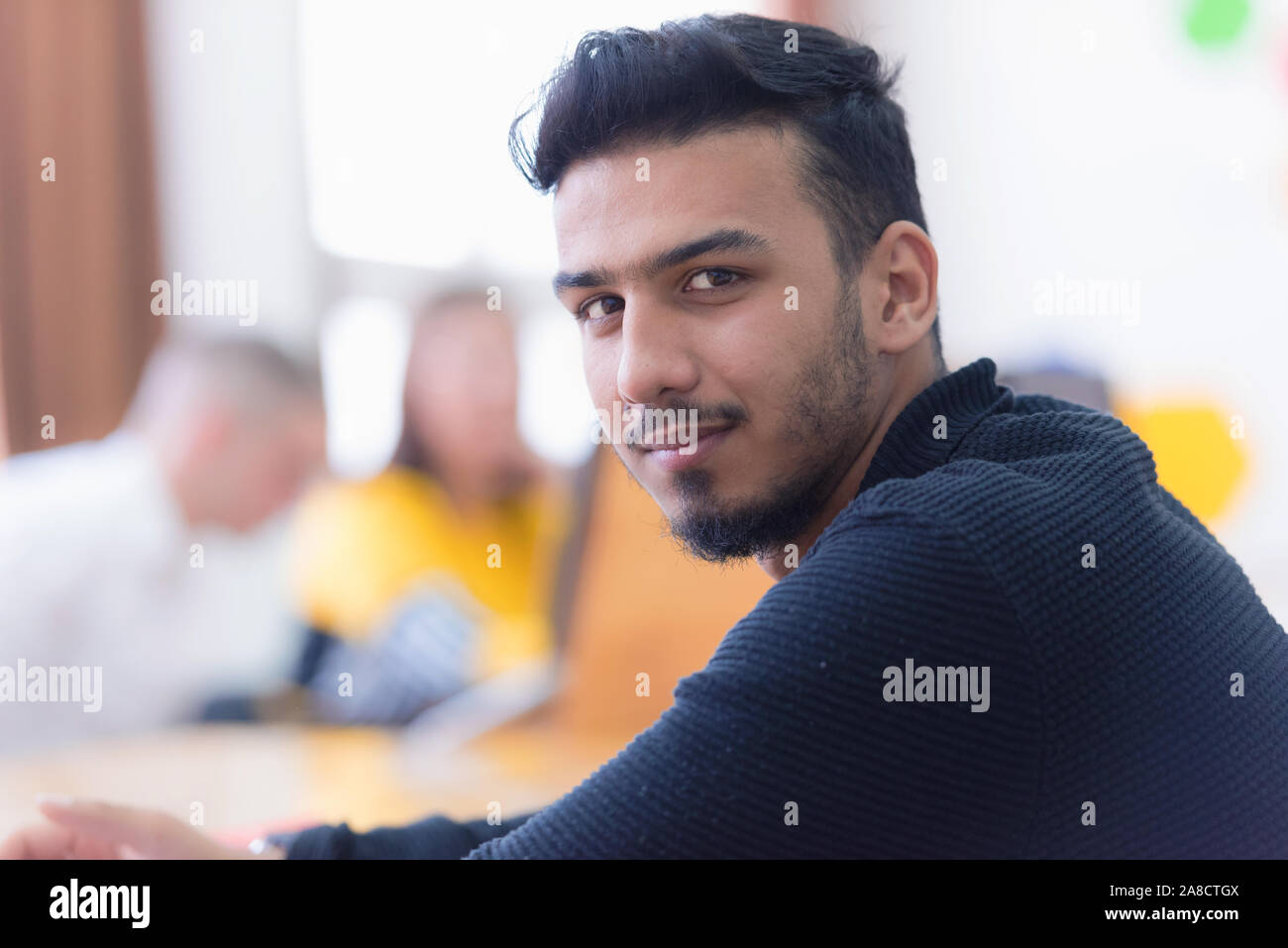 Male african american university student work at computer lab at ...