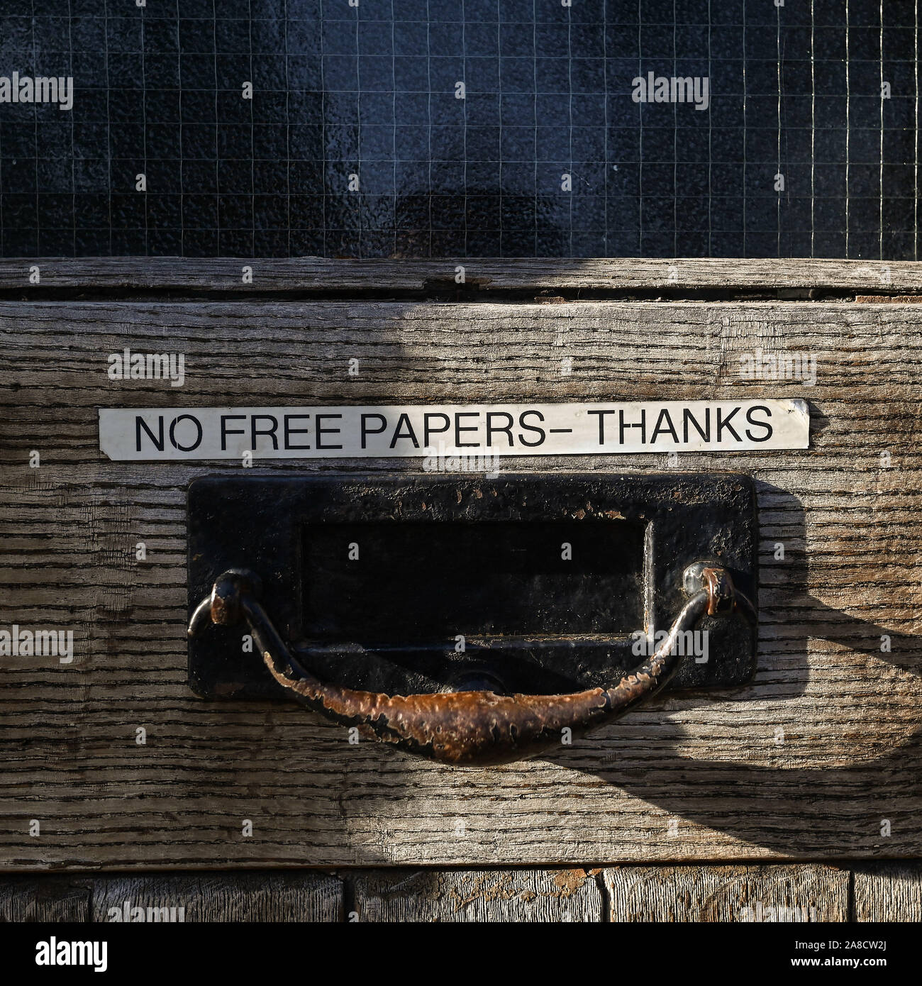 NO FREE PAPERS - THANKS sign pictured on a letter box in Warwickshire ...