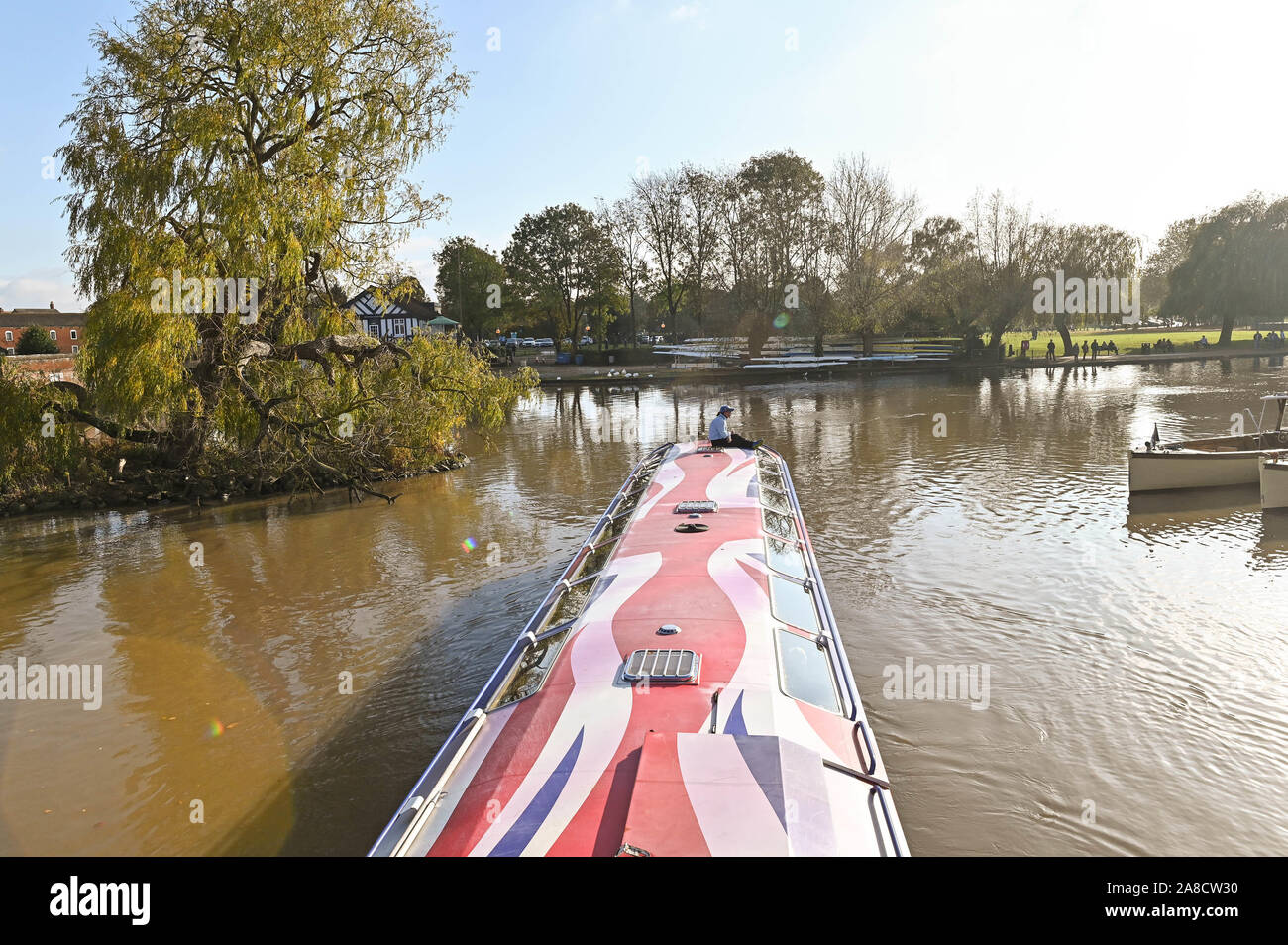 A tour barge on the River Avon is pictured powering out of a lock in ...