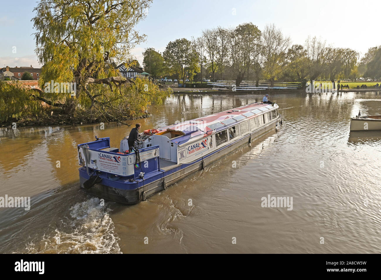 A tour barge on the River Avon is pictured powering out of a lock in ...