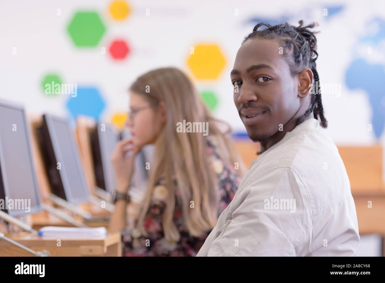 Group of students study in modern school computer lab classroom ...
