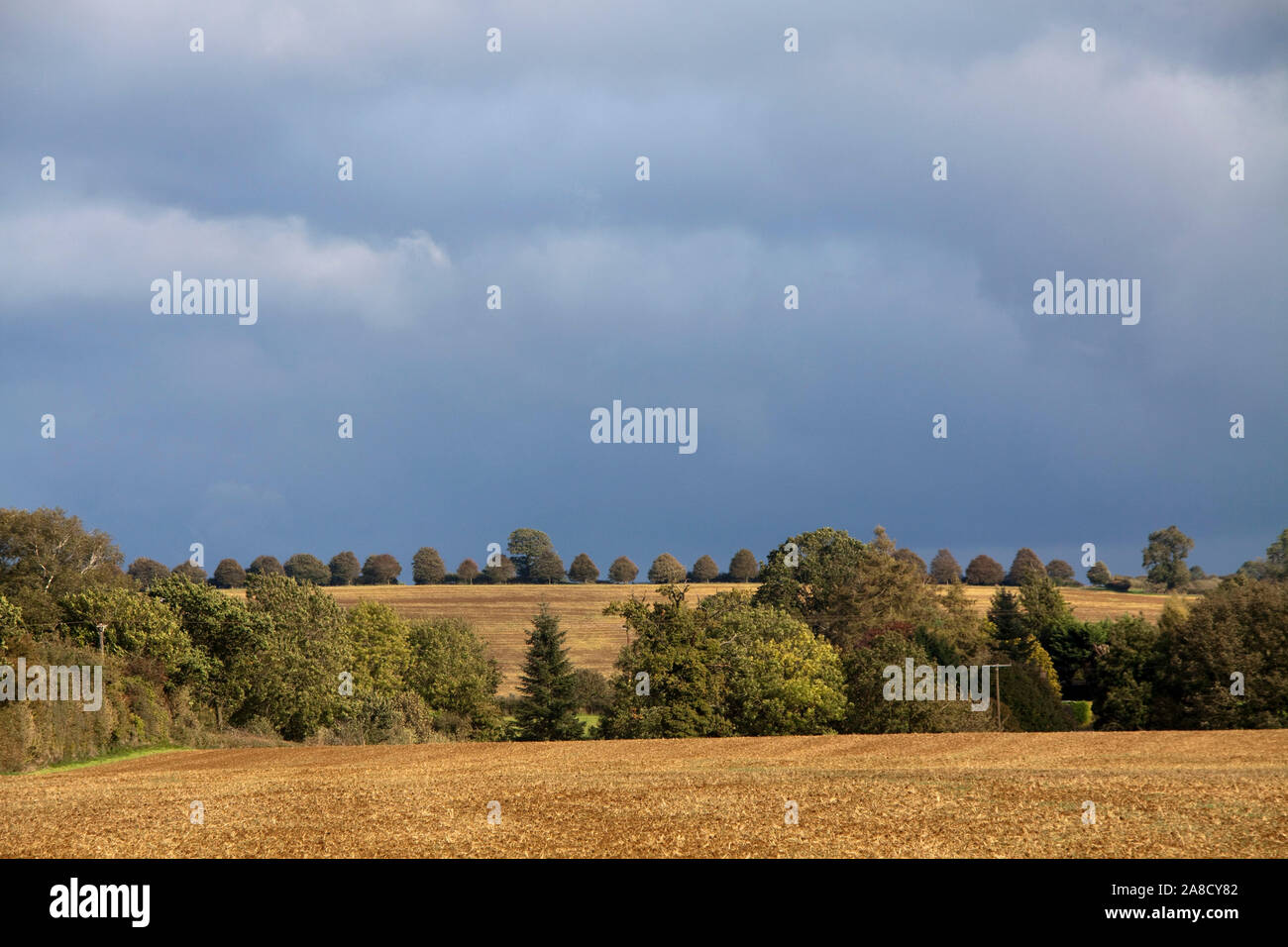 Rain Clouds over Countryside Stock Photo - Alamy