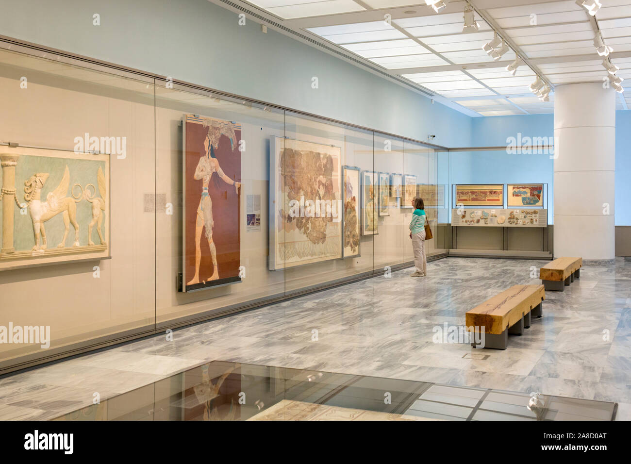 Heraklion Crete Greece Visitor Looking At Minoan Frescoes On Display Heraklion Crete Greece Visitor Looking At Minoan Frescoes On Display