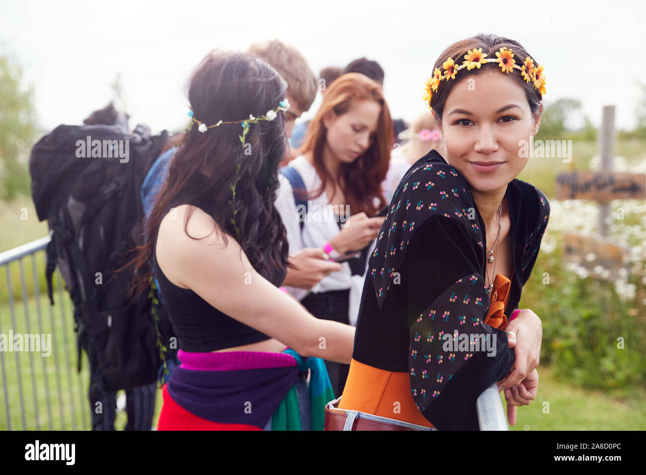 People waiting behind barrier hi-res stock photography and images - Alamy