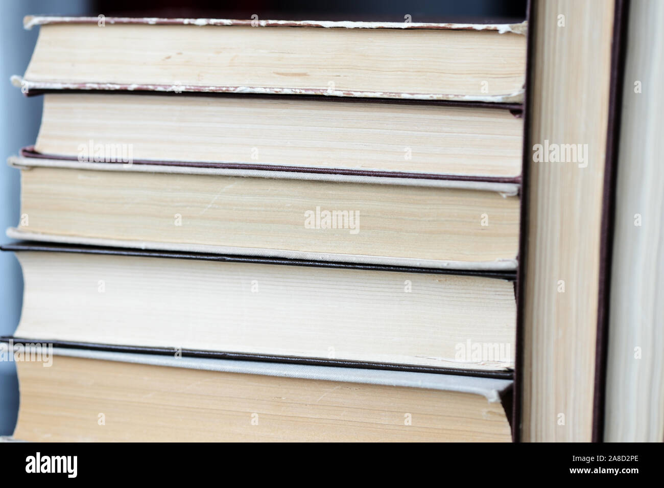 A stack of old books close-up. Educational background Stock Photo - Alamy
