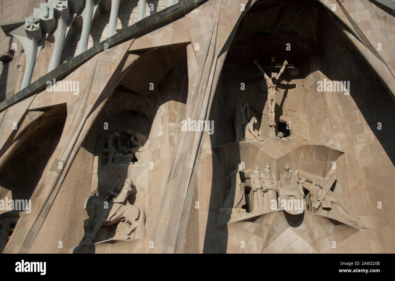 Sagrada Familia Basilica in Barcelona, Spain. Detail from the passion facade with crucifixion ...