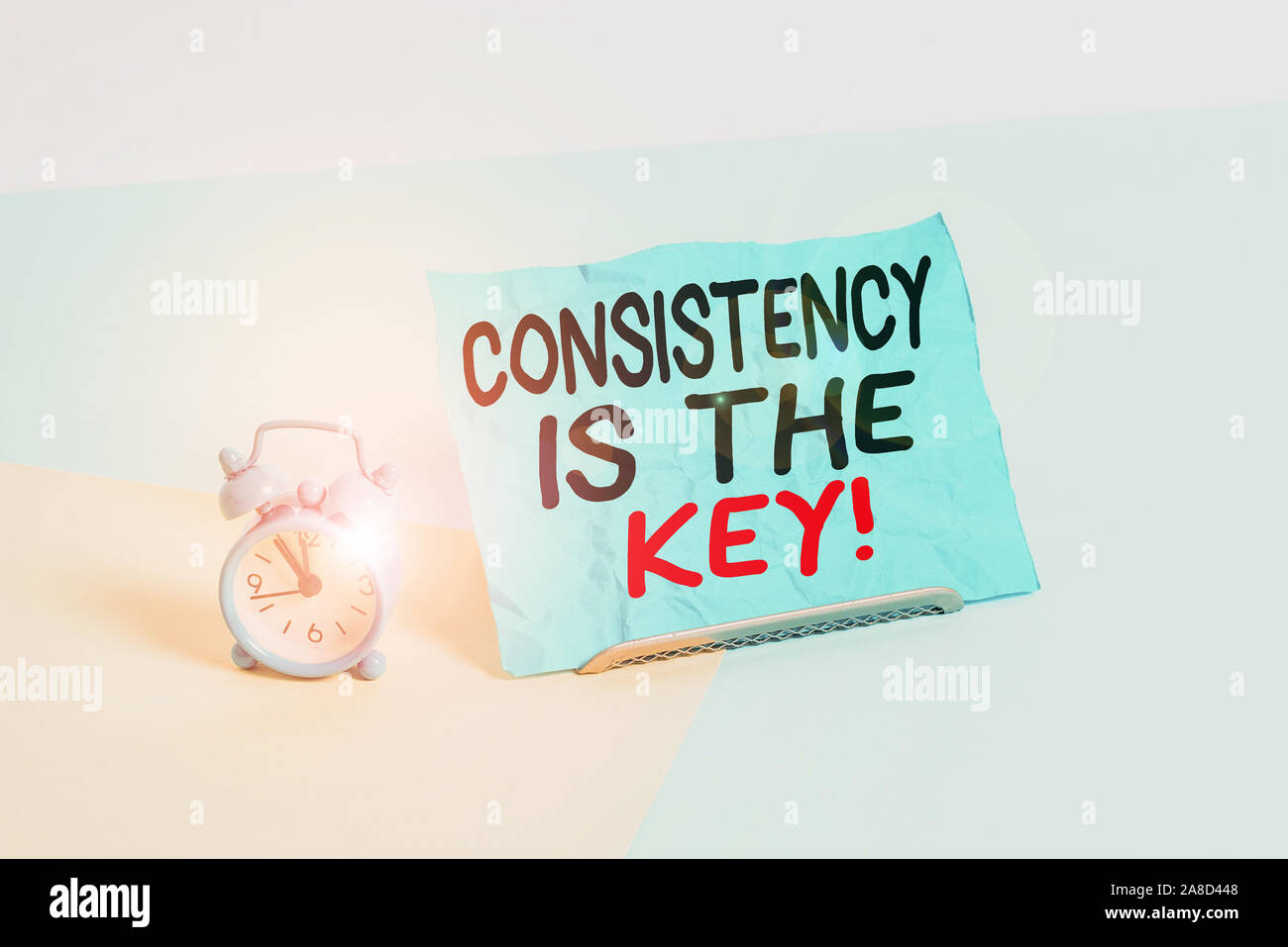 Writing note showing Consistency Is The Key. Business concept for by ...
