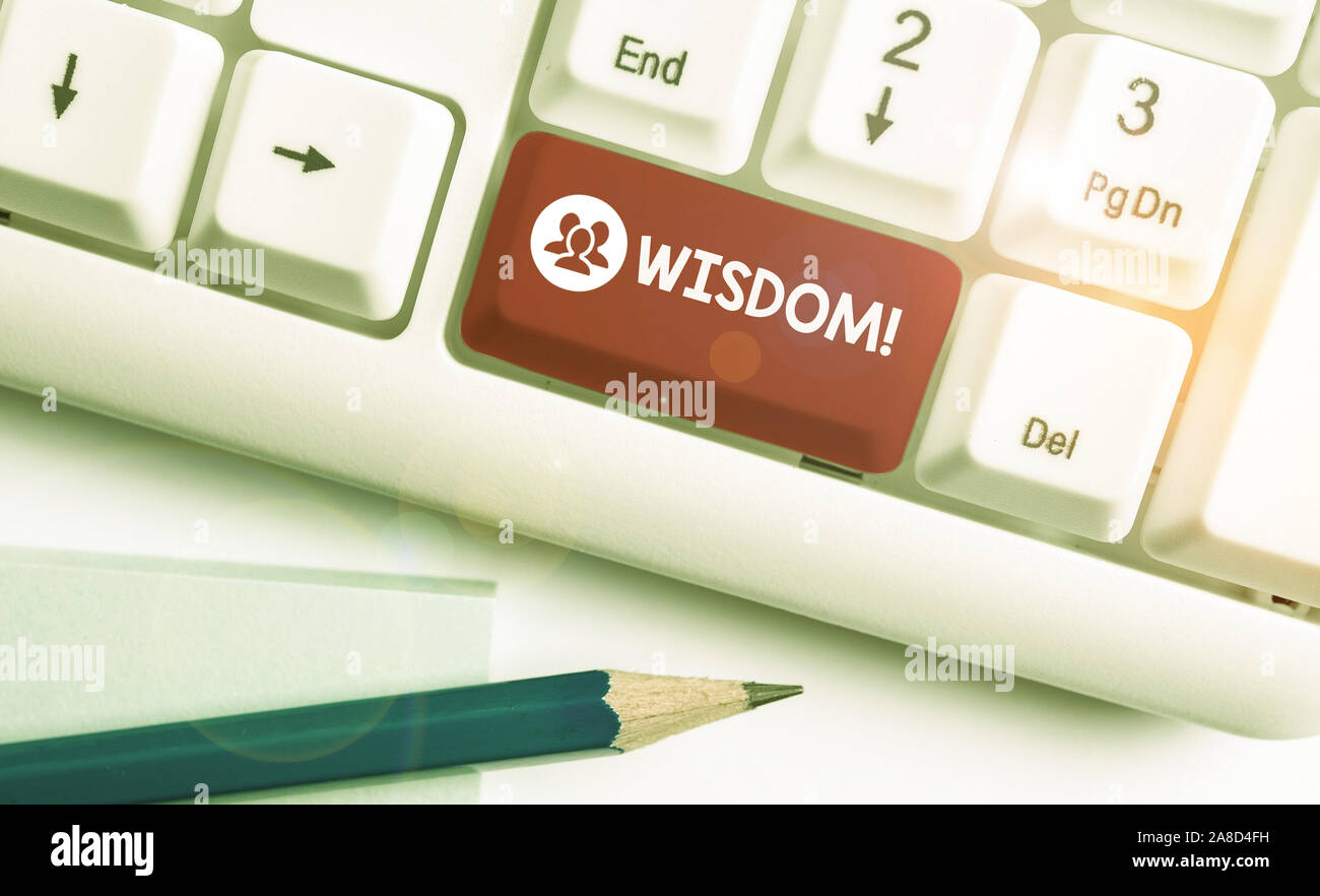 Writing note showing Wisdom. Business concept for the ability to use ...