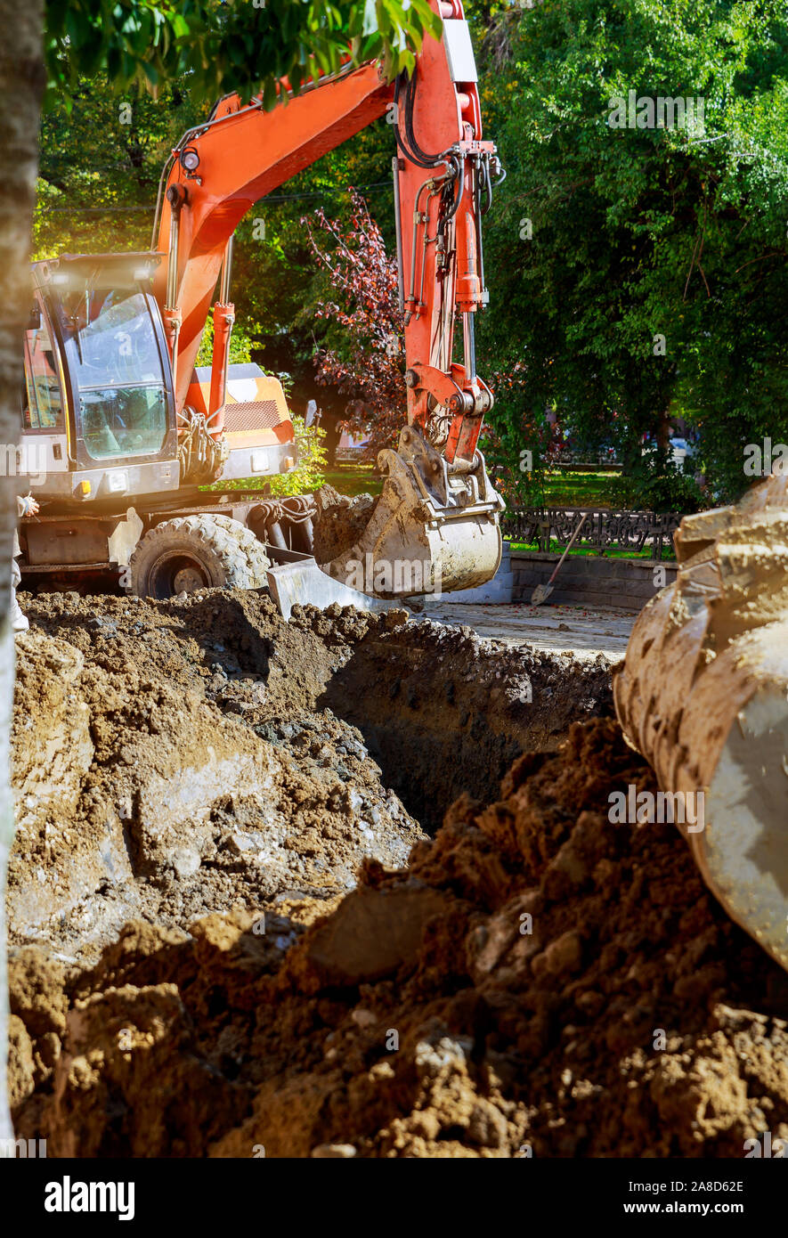 Outdoor work : Excavator digging to moving the soil in construction ...