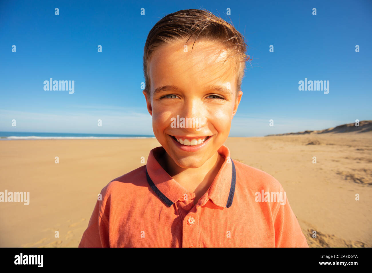 Close face portrait of a boy smile on the beach Stock Photo - Alamy