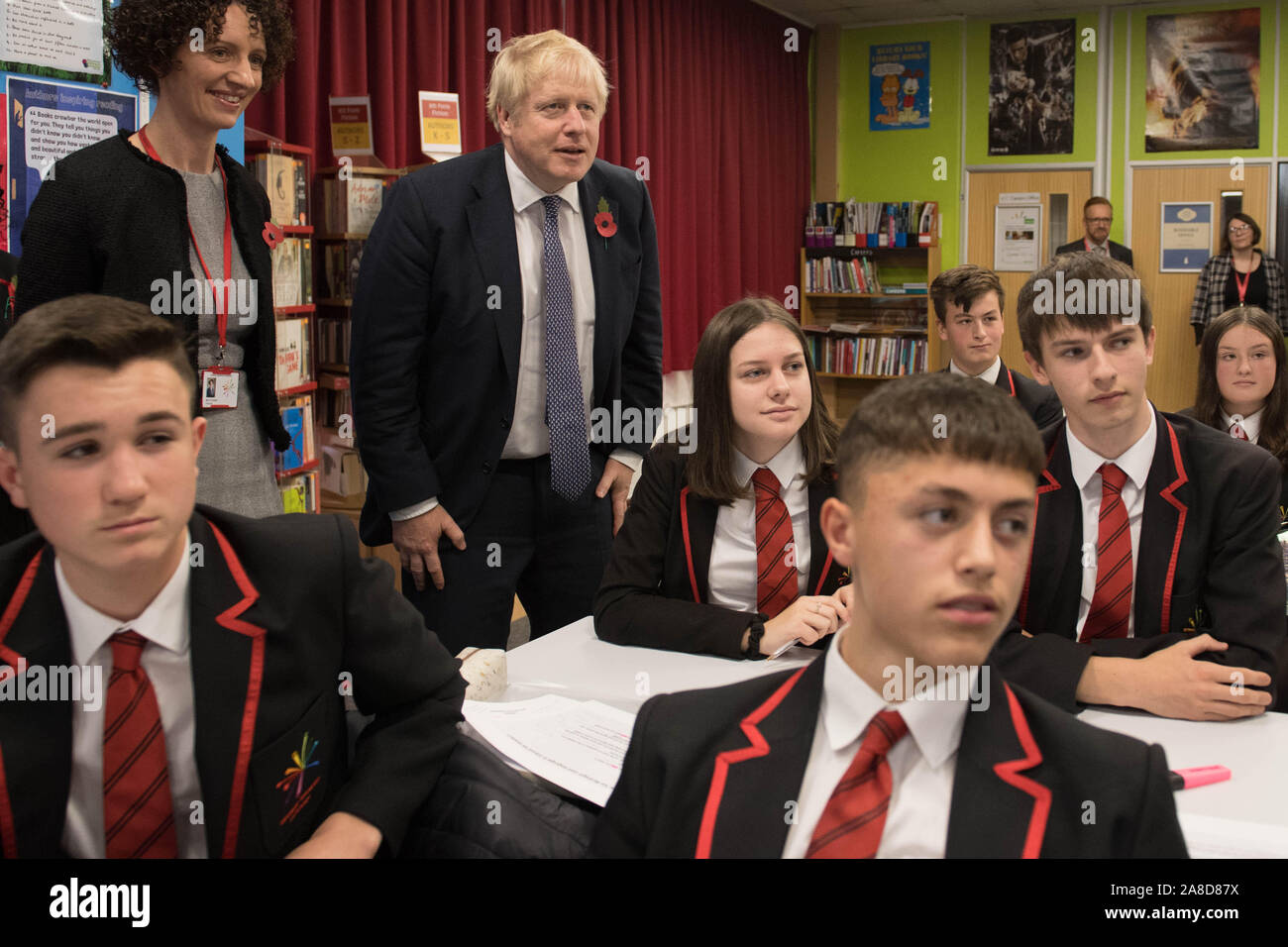 Prime Minister Boris Johnson joins pupils during a visit to George ...