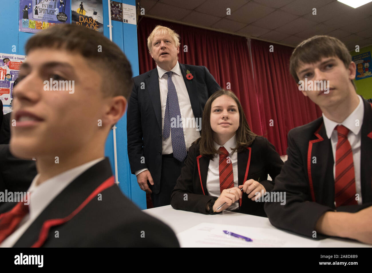 Prime Minister Boris Johnson joins pupils during a visit to George ...