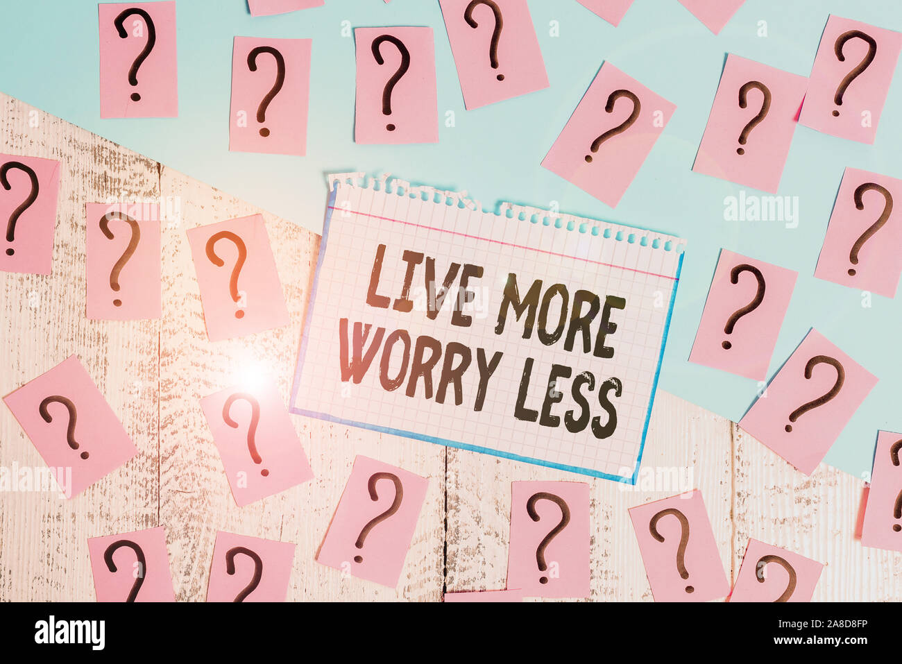 Writing note showing Live More Worry Less. Business concept for Have a ...