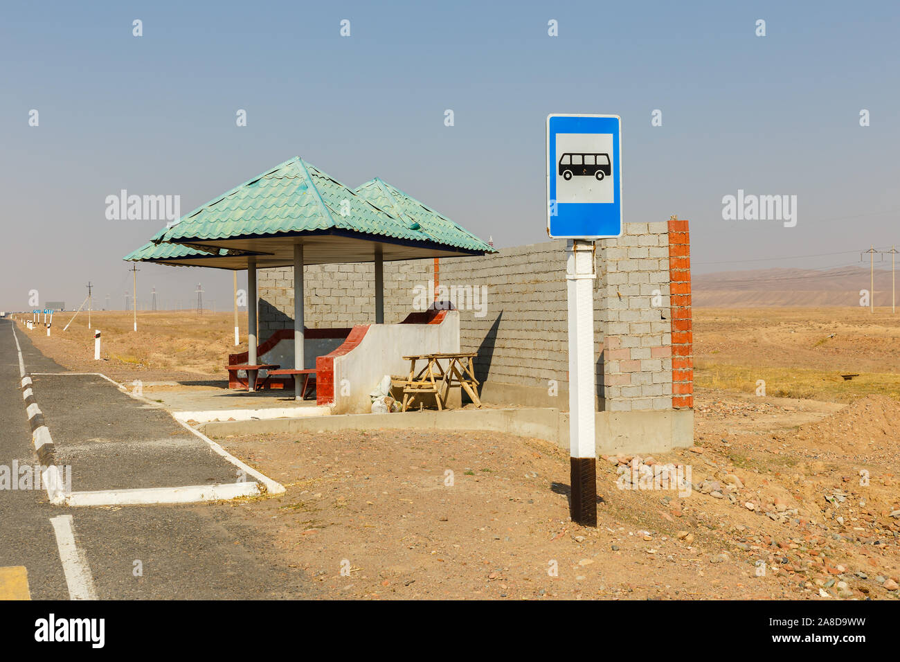 empty bus stop on the road, bus stop and road sign Stock Photo - Alamy