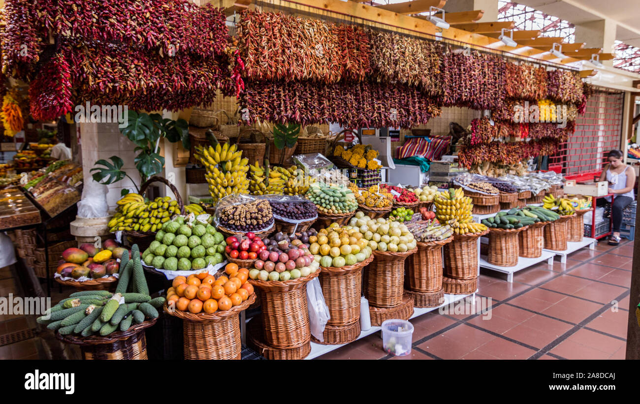 Fruits, vegetables and spices in local market hall in Funchal, Madeira ...