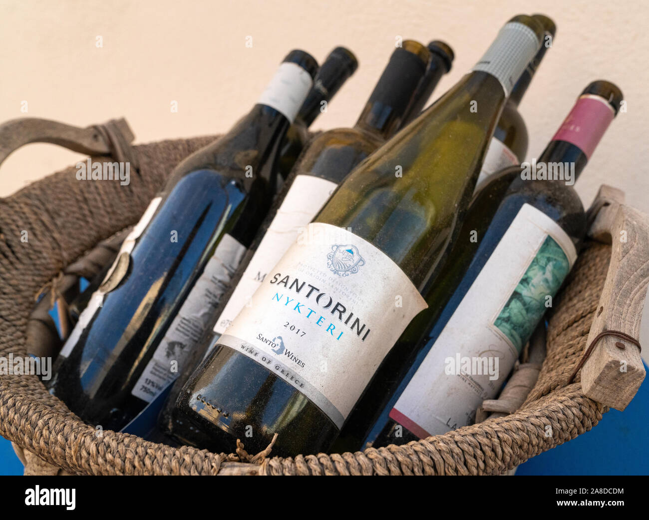 31st Oct 2019 - Santorini, Greece. Empty glass bottles of Santorini ...