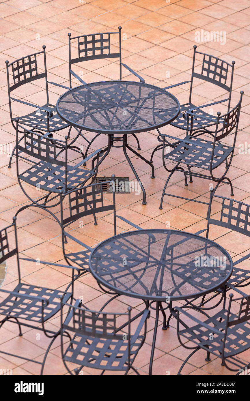 Black Metal Chairs and Tables at Patio Terrace Stock Photo - Alamy