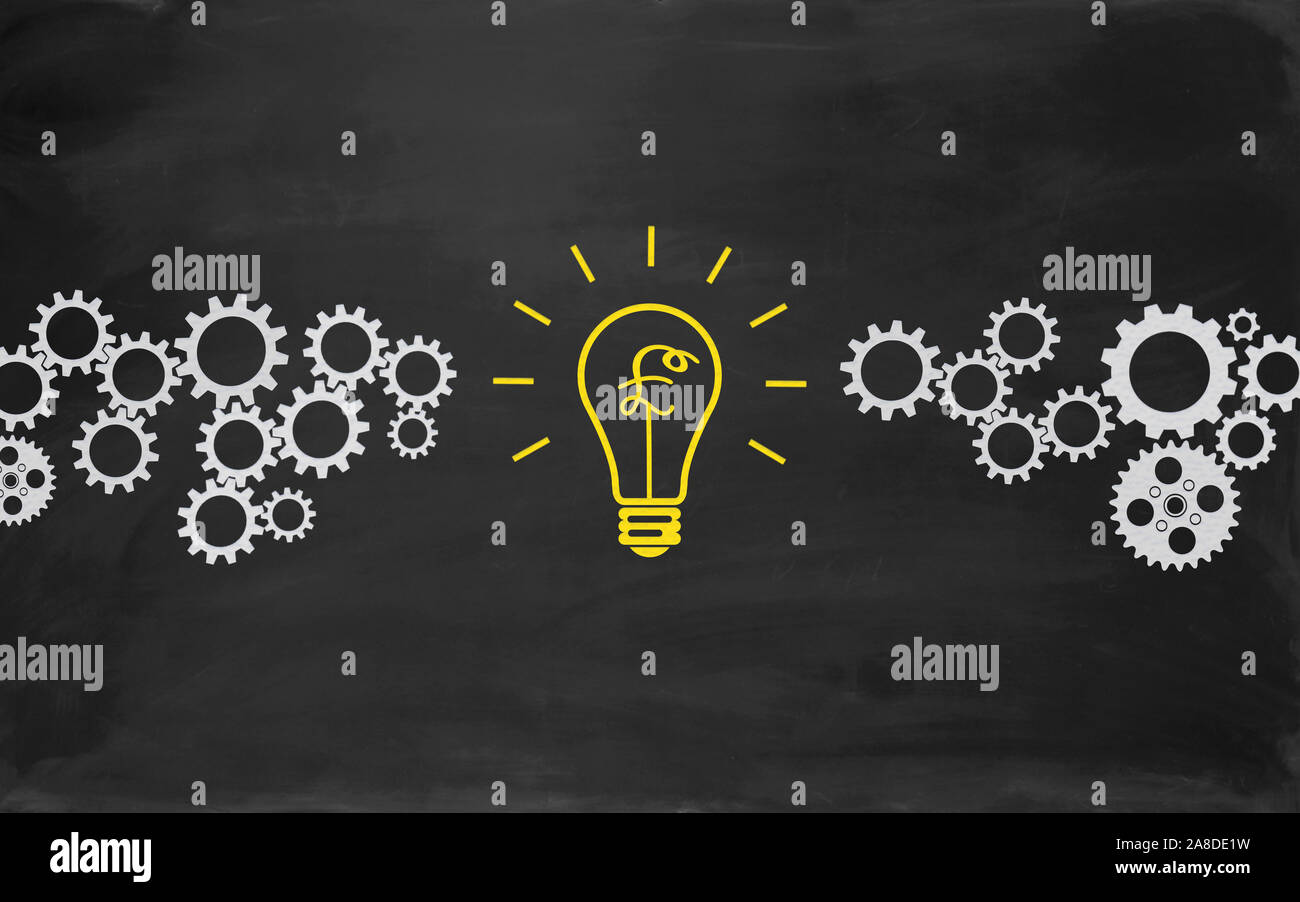 Idea light bulb concept and drawing with chalk on blackboard. Gear ...