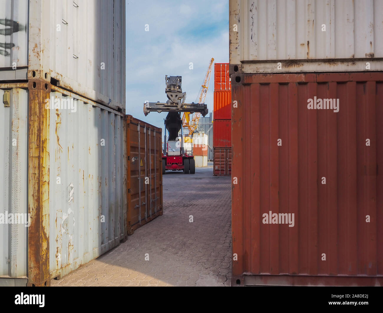 Container and lift truck in a harbour Stock Photo - Alamy