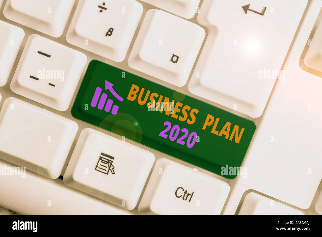 Writing note showing Business Plan 2020. Business concept for ...