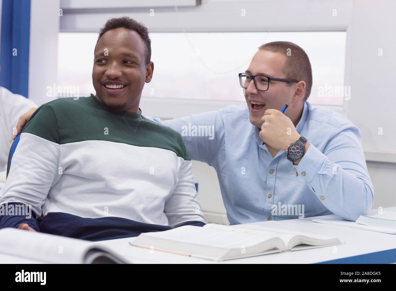 University Students during the class. Resolving problems together. Team ...