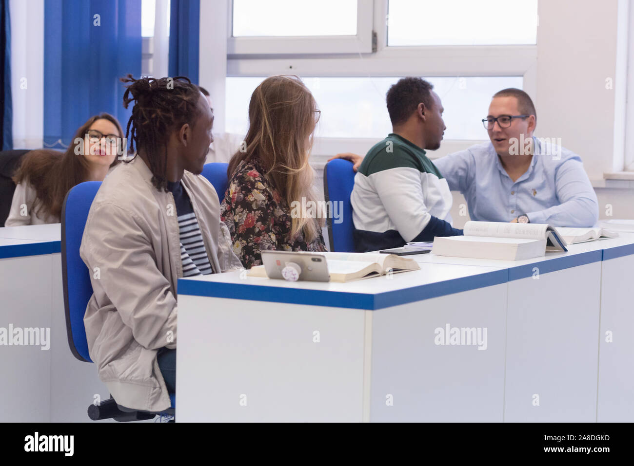 University Students during the class. Resolving problems together. Team ...