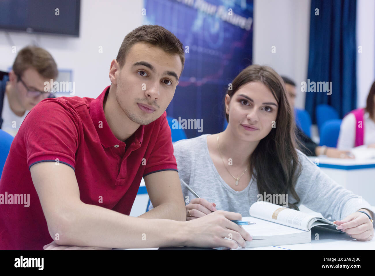University Students during the class. Resolving problems together. Team ...