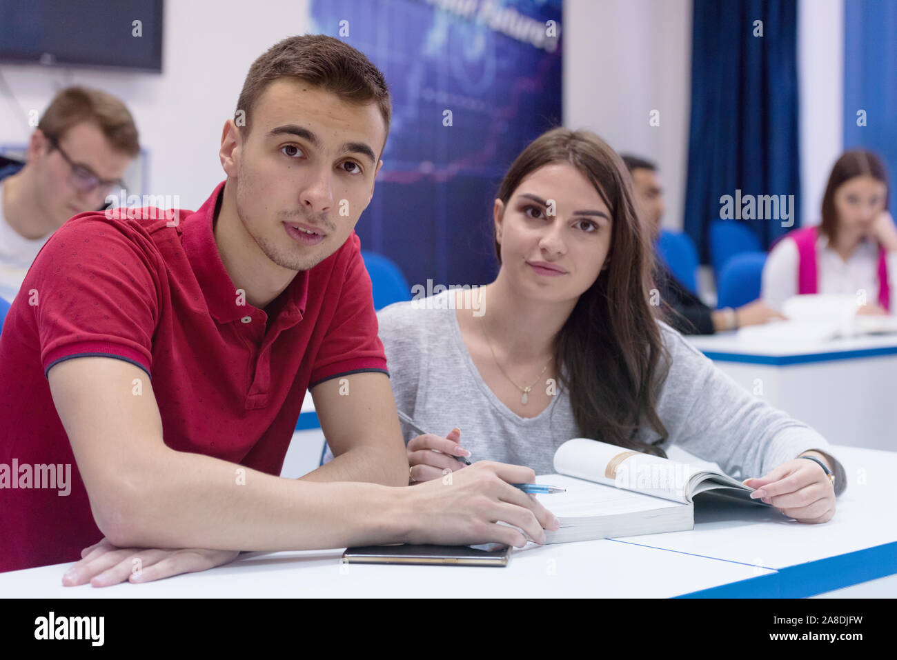 University Students during the class. Resolving problems together. Team ...