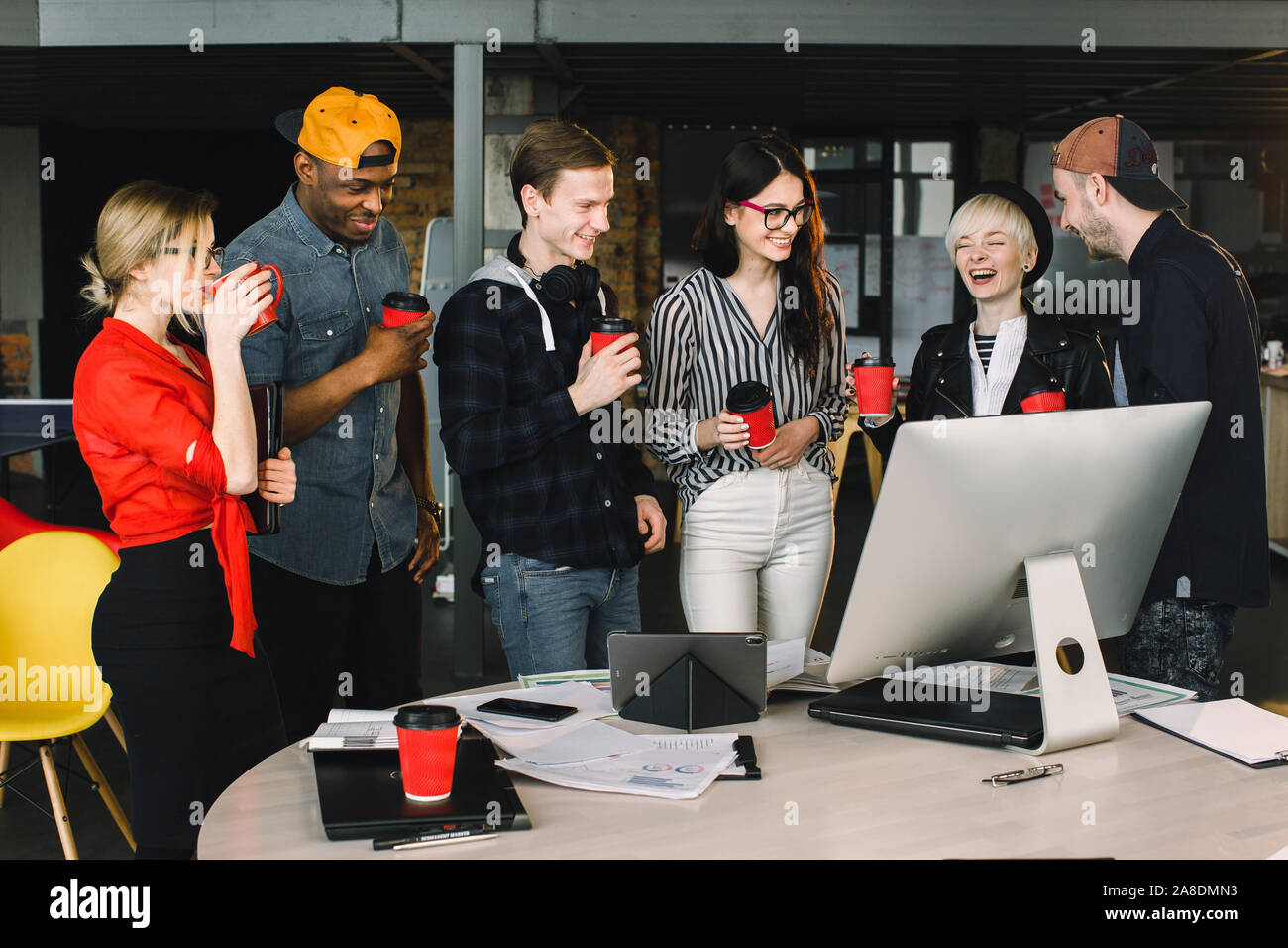 Pause for relax at work. Happy work team during break time in light ...