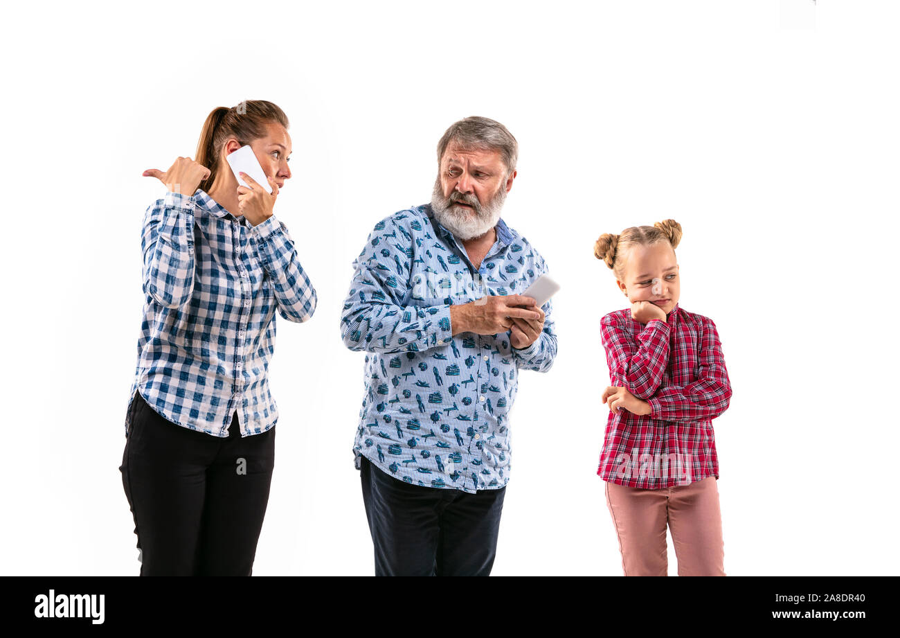 Family members arguing with one another on white studio background ...