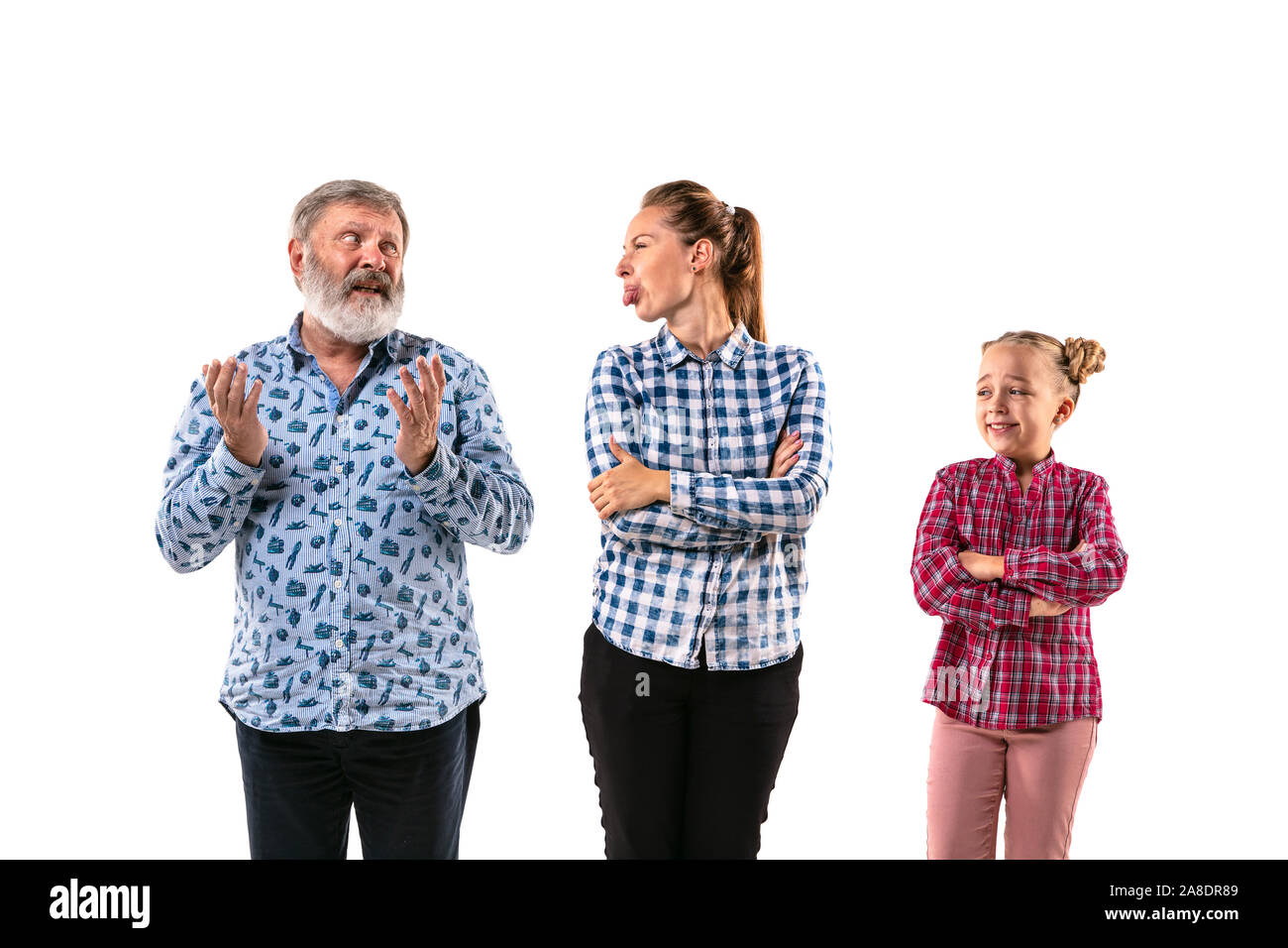 Family members arguing with one another on white studio background ...