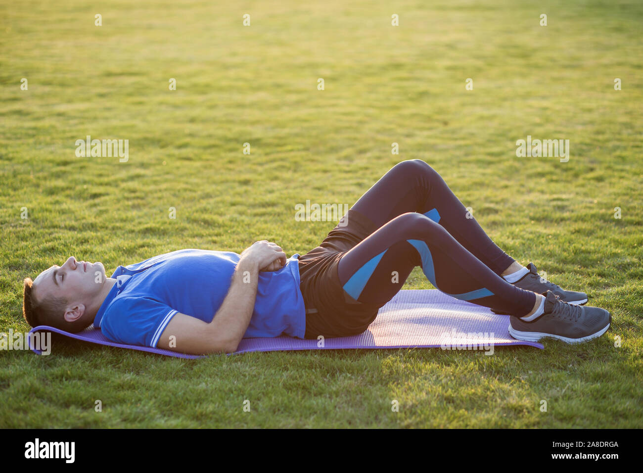 Boy laying on mat hi-res stock photography and images - Alamy