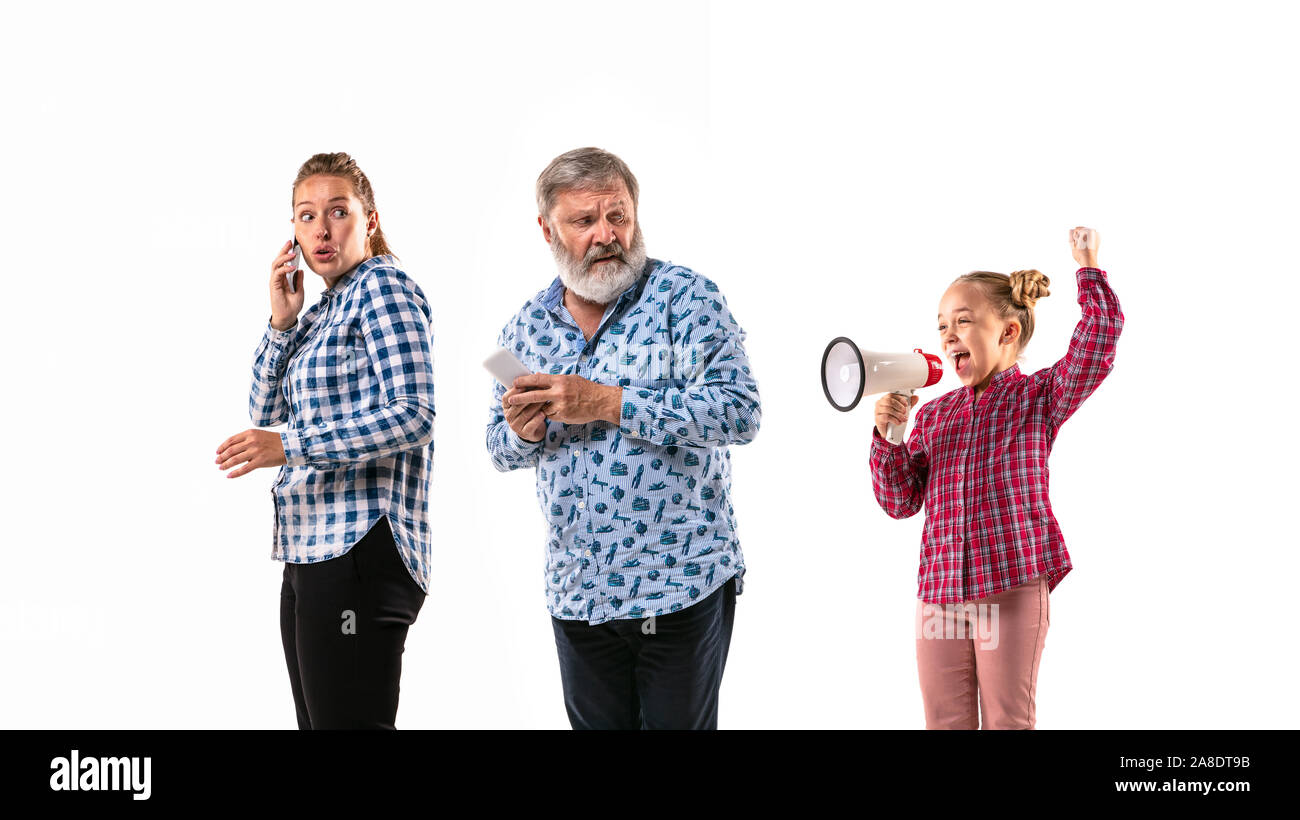 Family members arguing with one another on white studio background ...