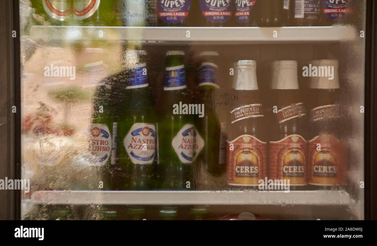 Fridge full of beer bottles Stock Photo - Alamy
