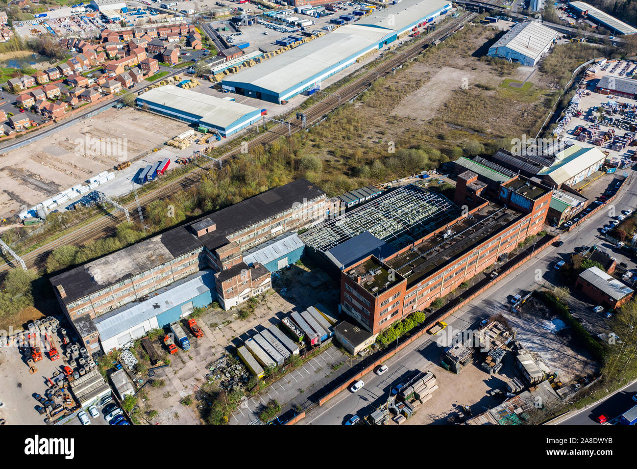 Aerial, overhead views of an abandoned factory, left to decline in the ...