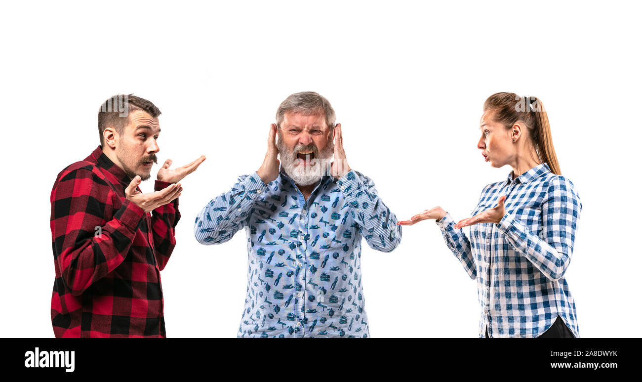 Family members arguing with one another on white studio background ...