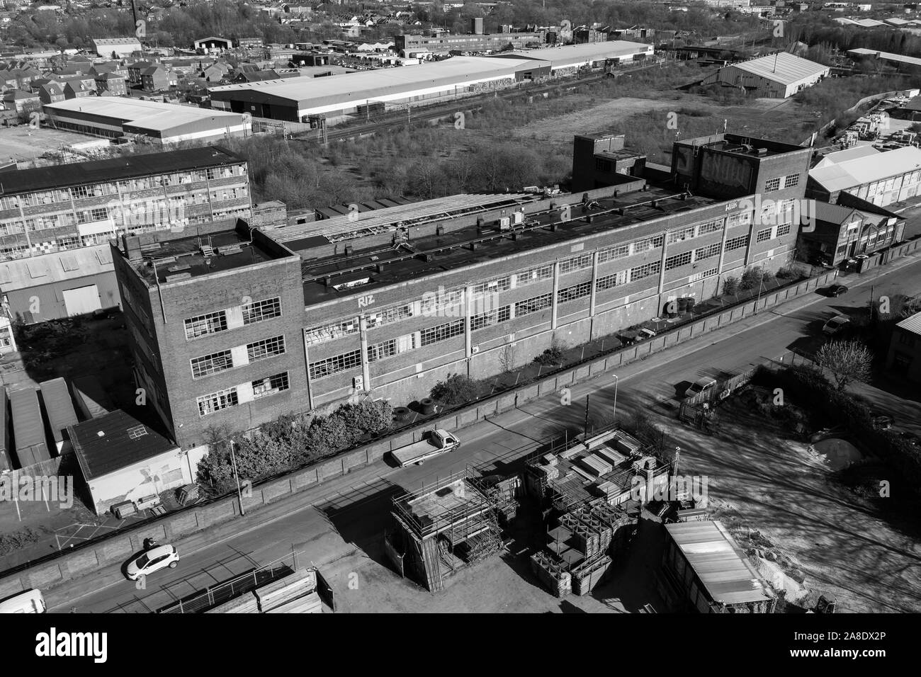 Interior of a busy factory interior of a busy factory Black and White ...