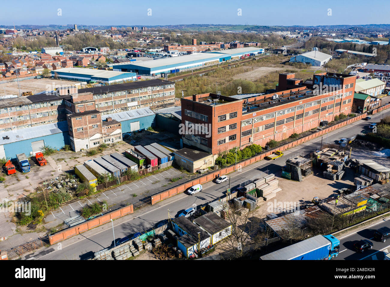 Aerial, overhead views of an abandoned factory, left to decline in the ...