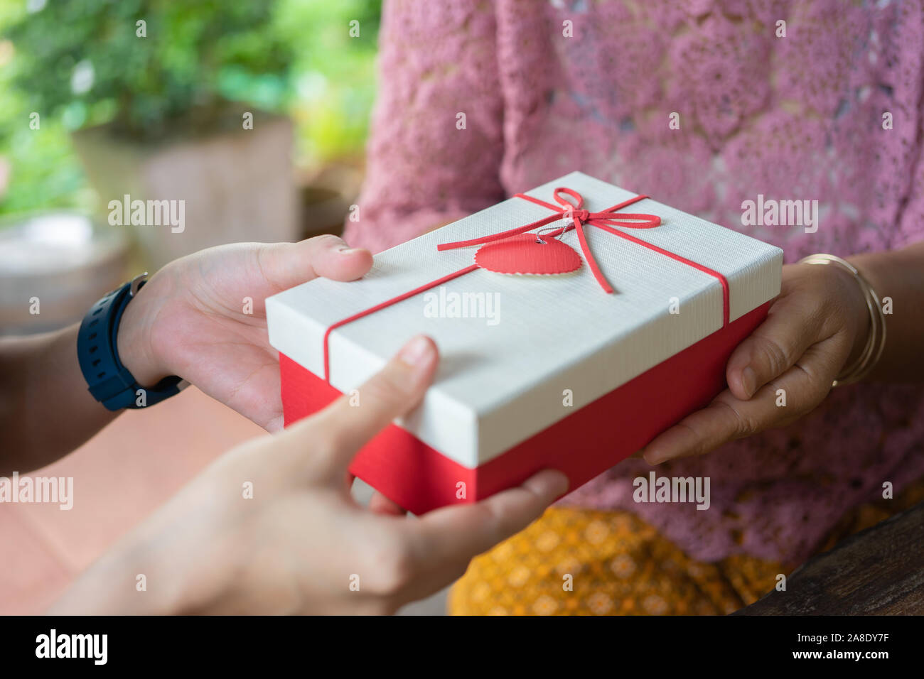 Giving gifts to loved ones at important festivals. Chrismas Day, New ...