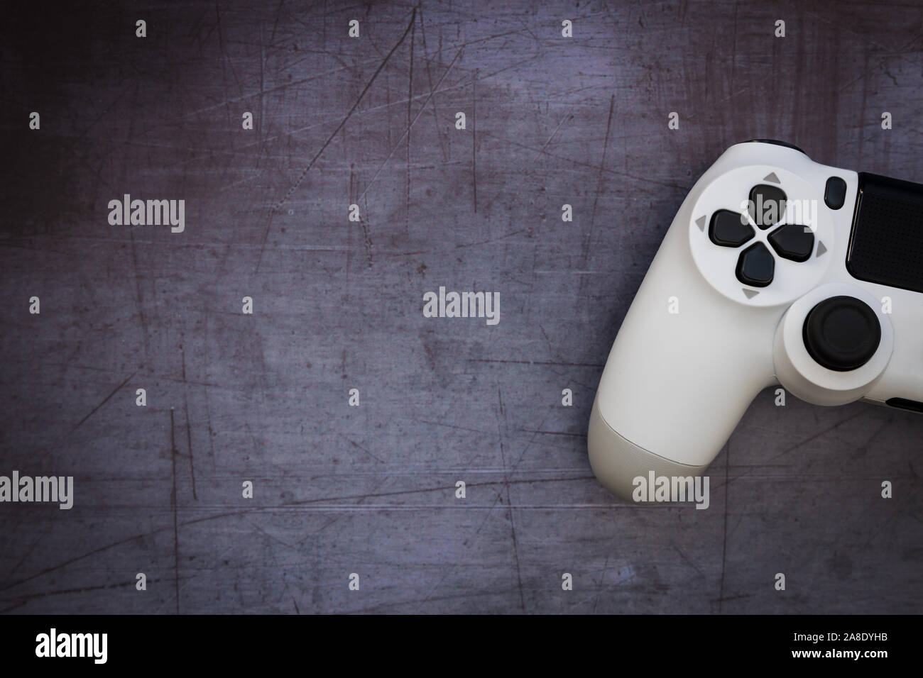 Video games white gaming controller isolated on dark moody background ...