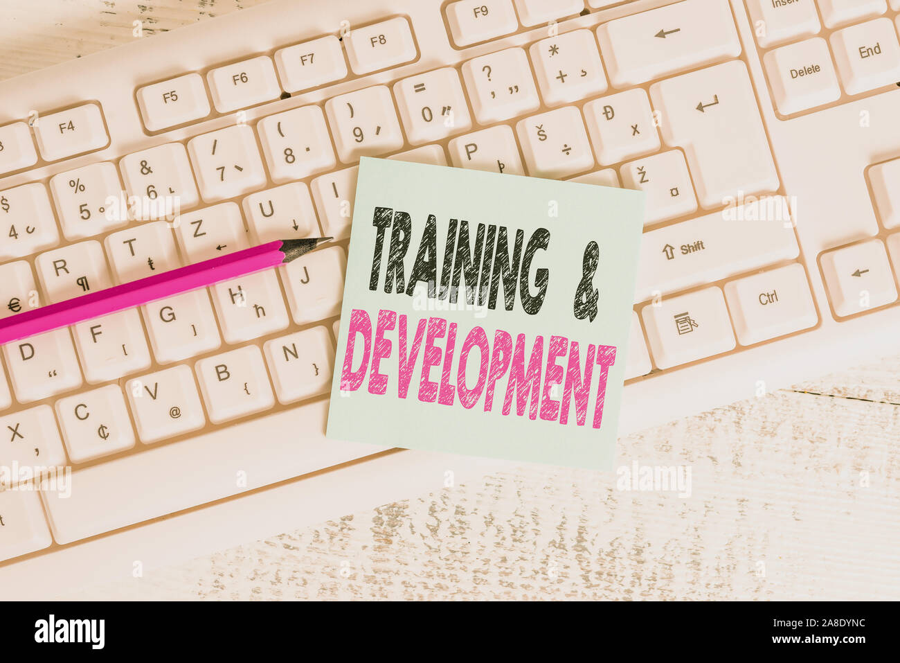 Writing note showing Training And Development. Business concept for ...