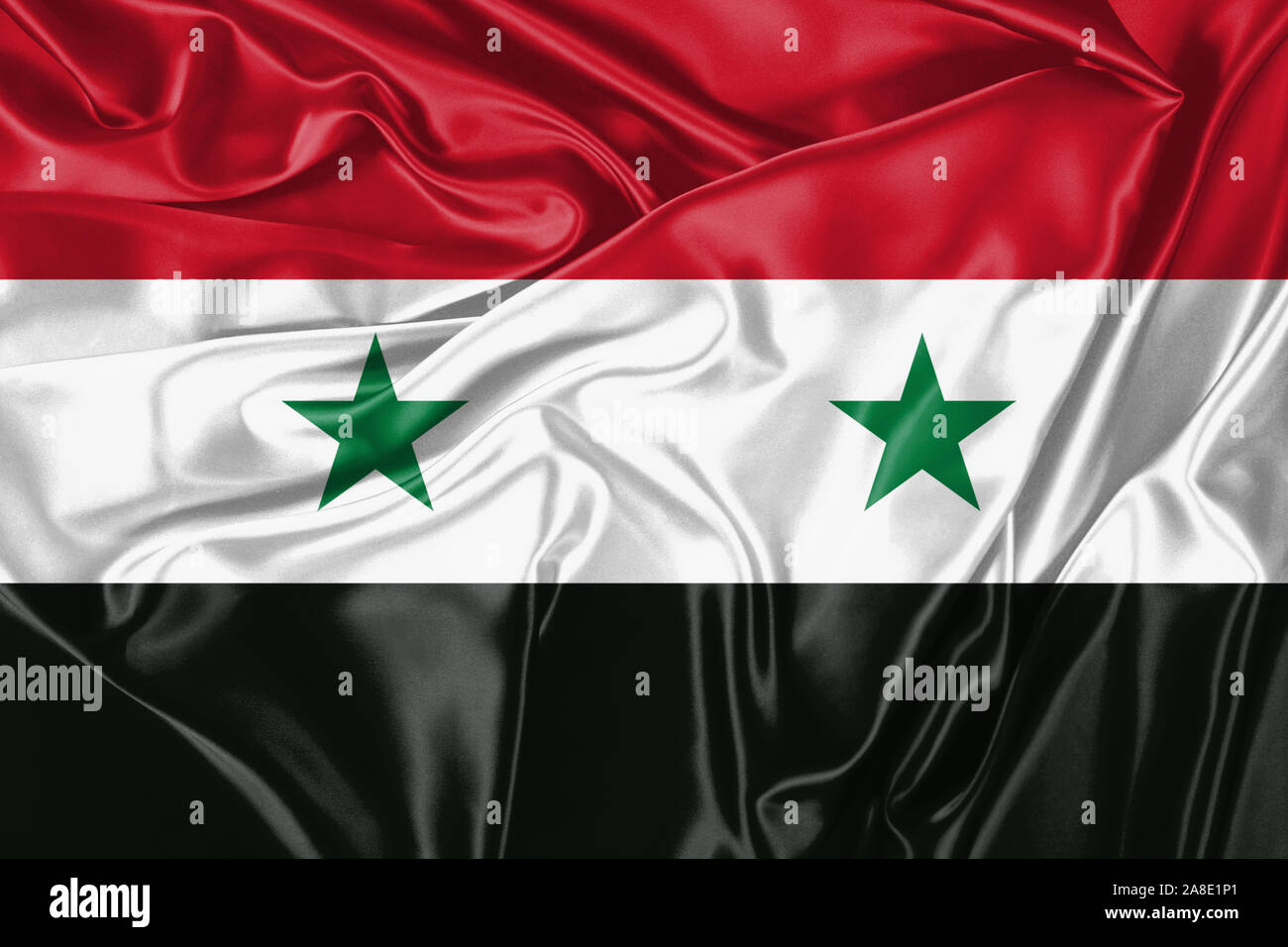 Shiny crippled Syrian flag is laying on a surface. Realistic ...