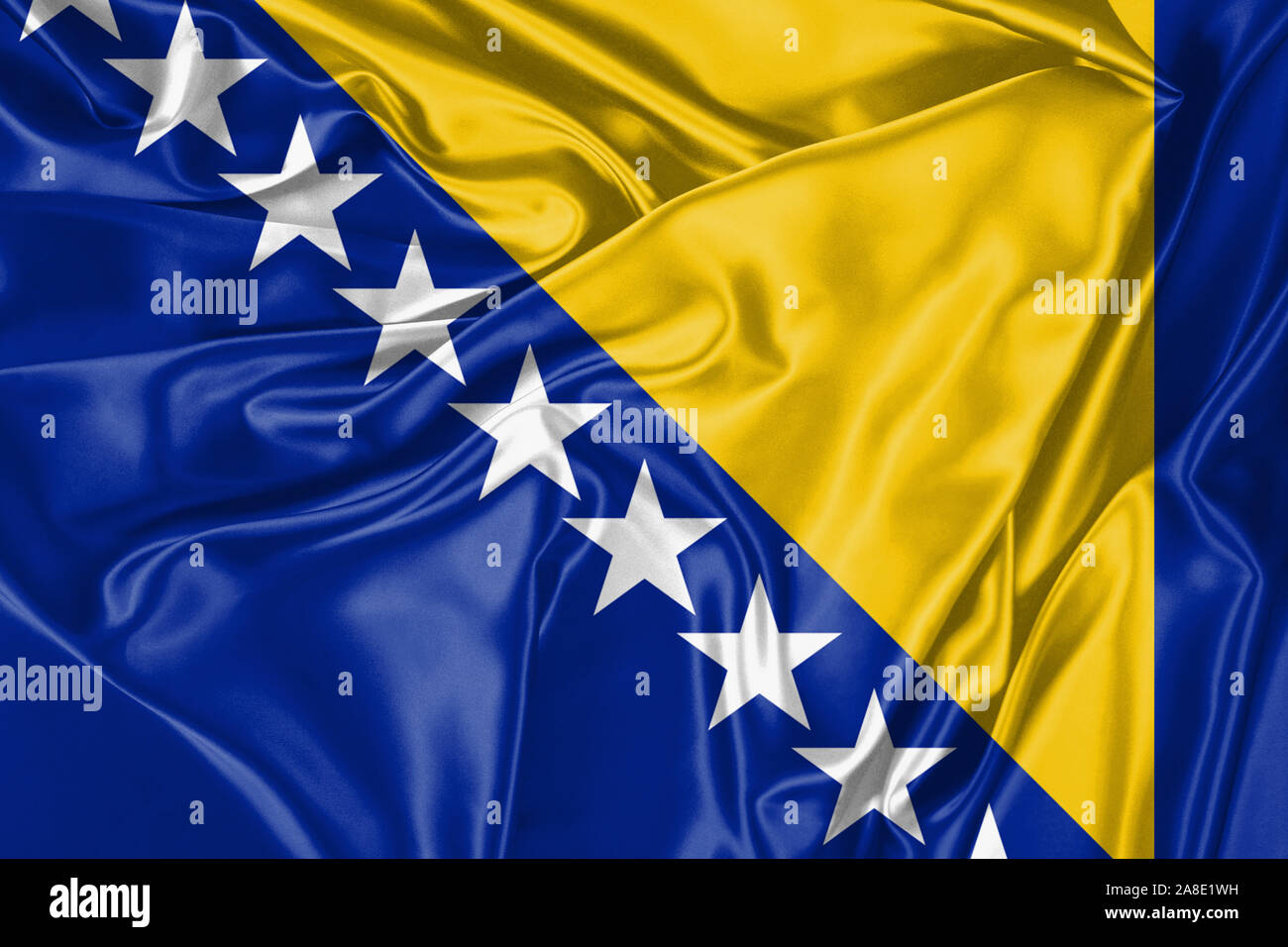 Shiny crippled Bosnia and Herzegovina flag is laying on a surface ...