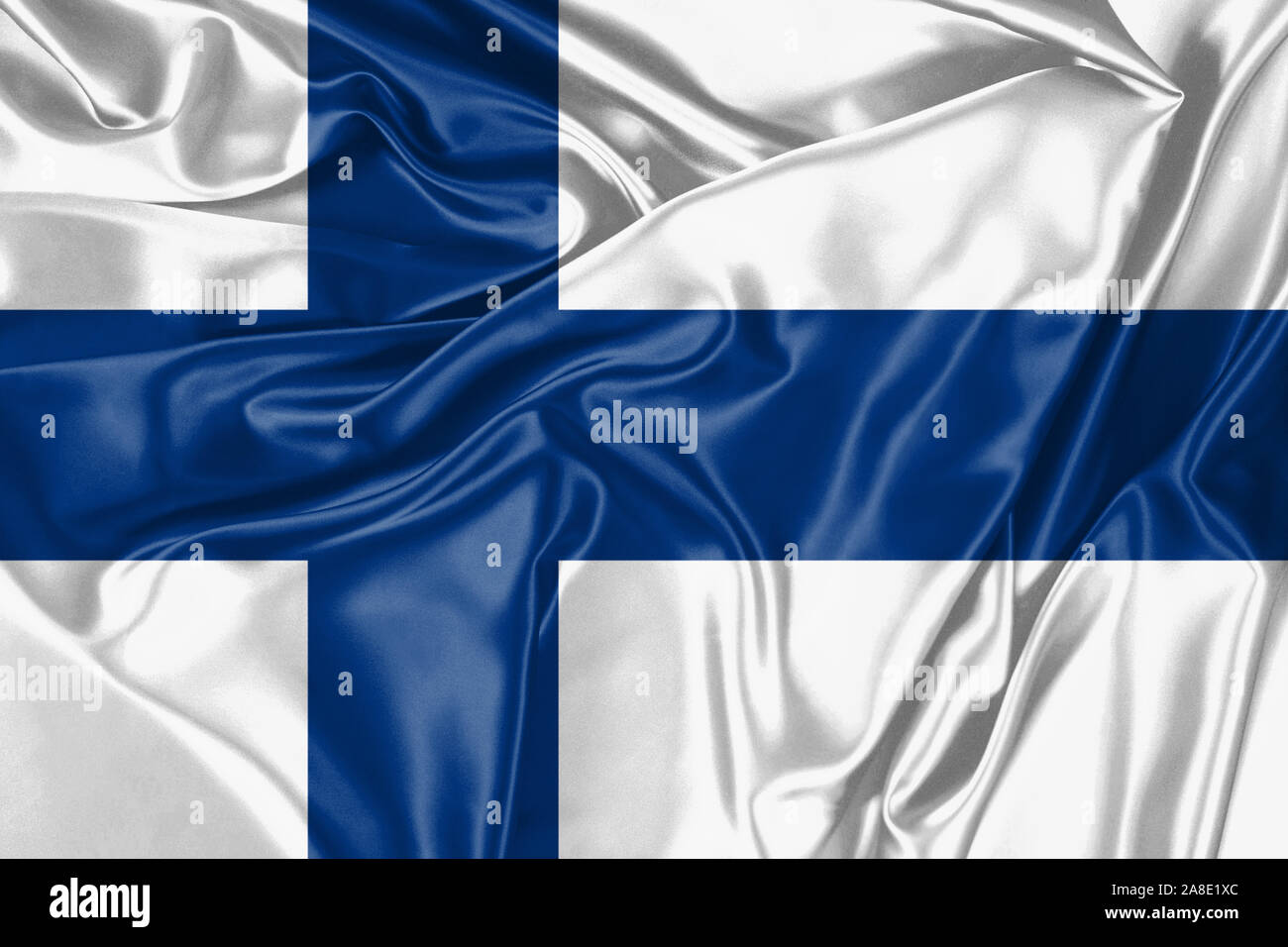 Shiny crippled Finnish flag is laying on a surface. Realistic ...