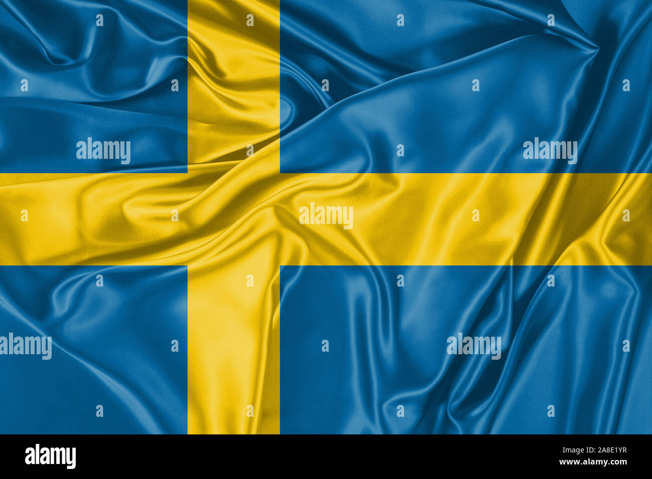 Shiny crippled Swedish flag is laying on a surface. Realistic ...