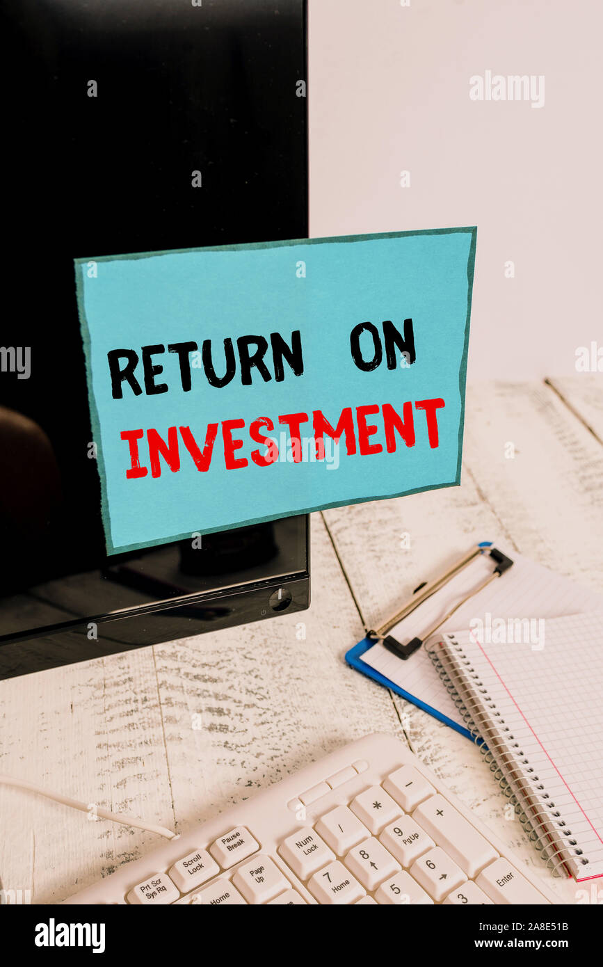 Writing note showing Return On Investment. Business concept for Ratio ...