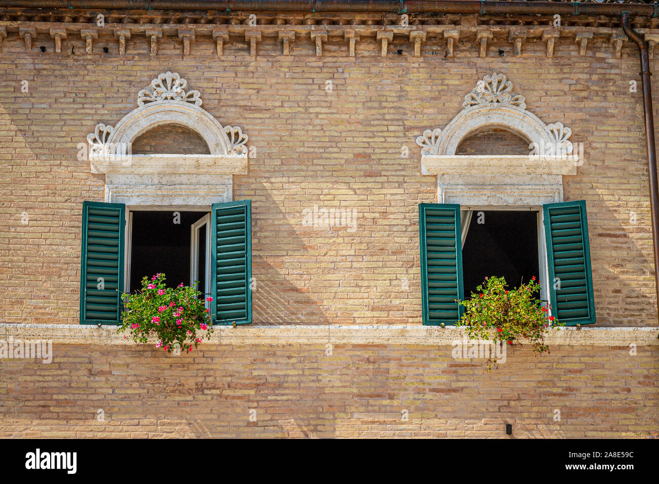windows in the facades of ancient medieval houses Stock Photo - Alamy