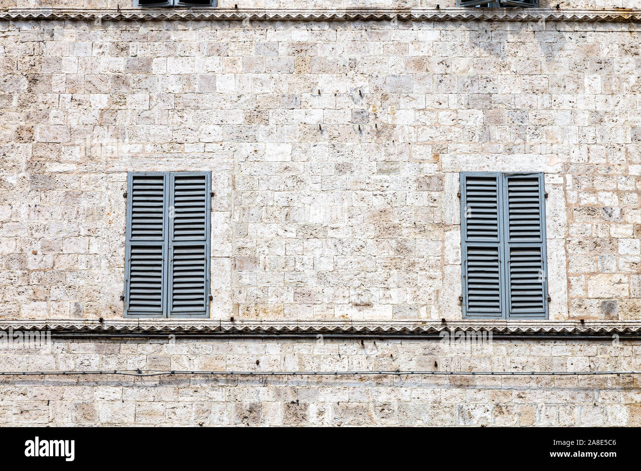 windows in the facades of ancient medieval houses Stock Photo - Alamy
