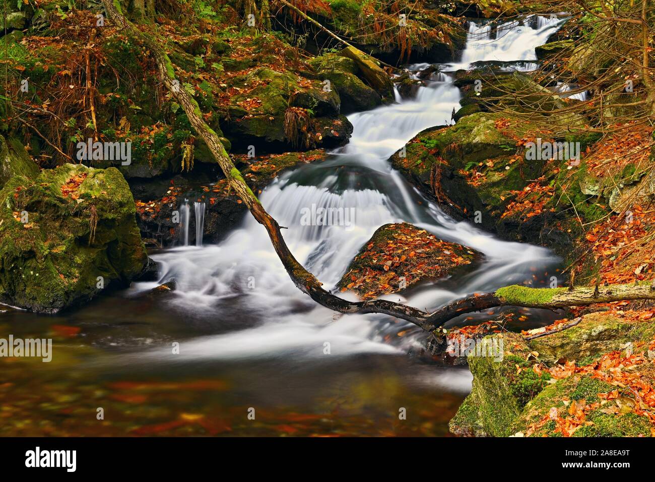 Beautiful colorful background with river and stones in autumn time ...